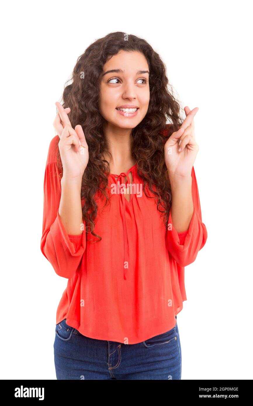 Woman with crossed fingers, isolated over a white background Stock ...