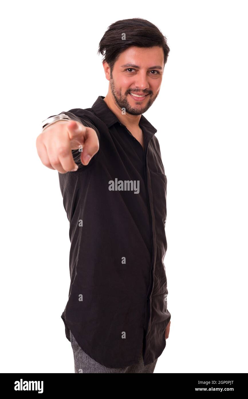Handsome young man pointing at you, isolated over white background ...