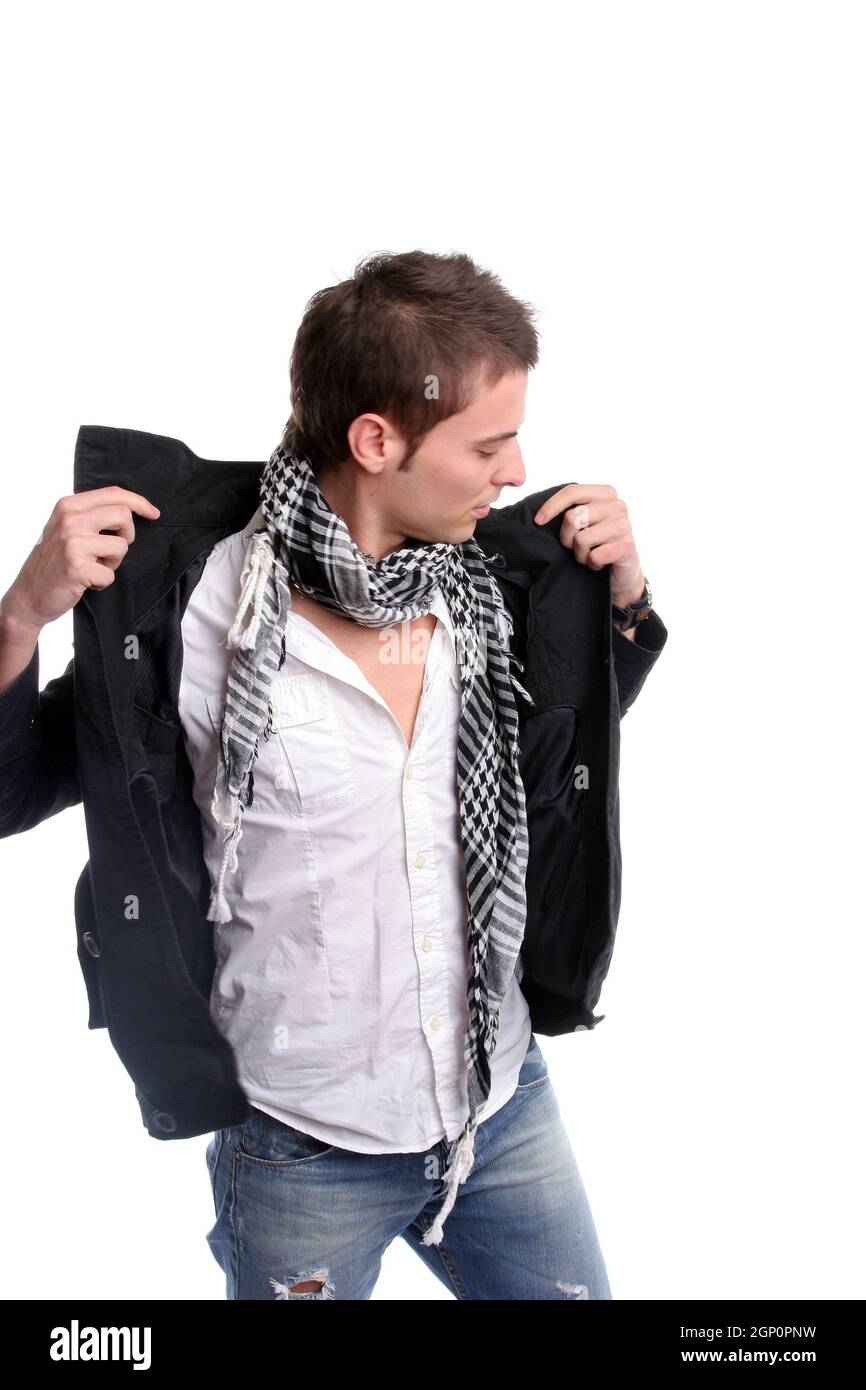 Young casual man, dressing his coat, isolated in white background Stock ...