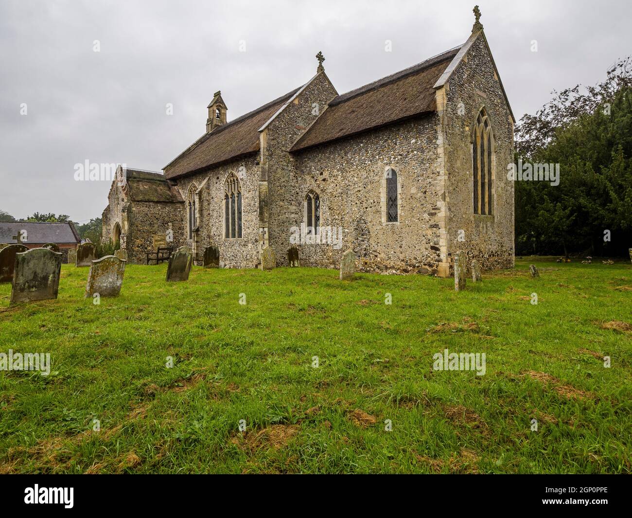 St Lawrence Church with thatched roof in Ingworth, Norfolk, England ...
