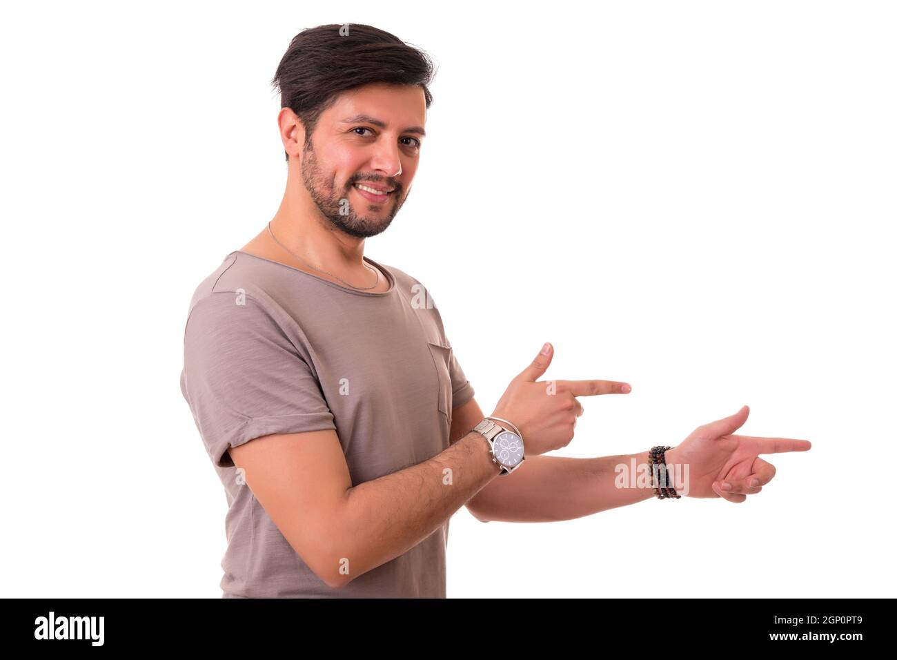 Young man presenting your product, isolated over a white background ...