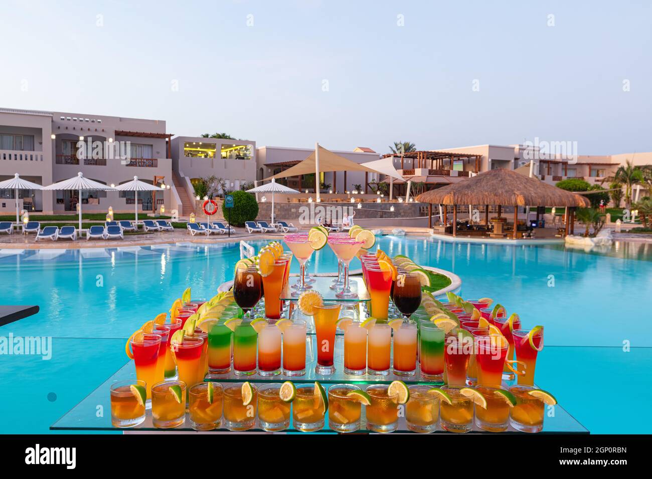 Pyramid of different coloured alcohol and non-alcohol Stock Photo - Alamy