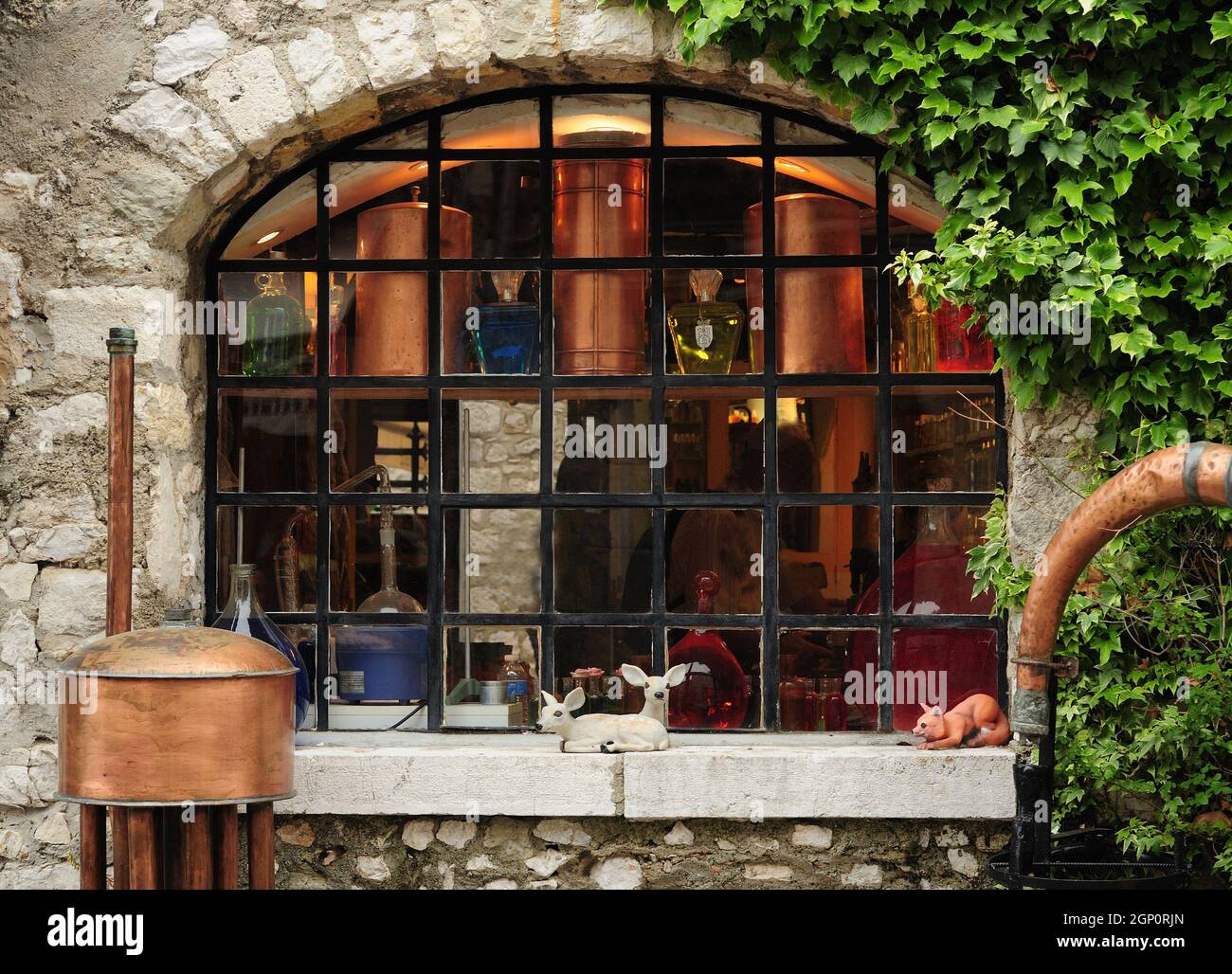 Looking Through A Window Into A Lavender Shop Decorated With ...