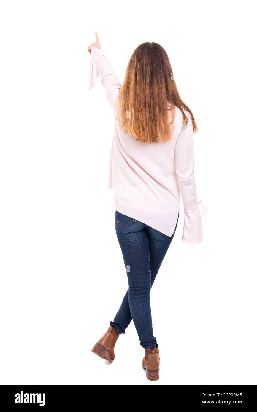 Woman posing with her back faced to camera, isolated over copy space ...