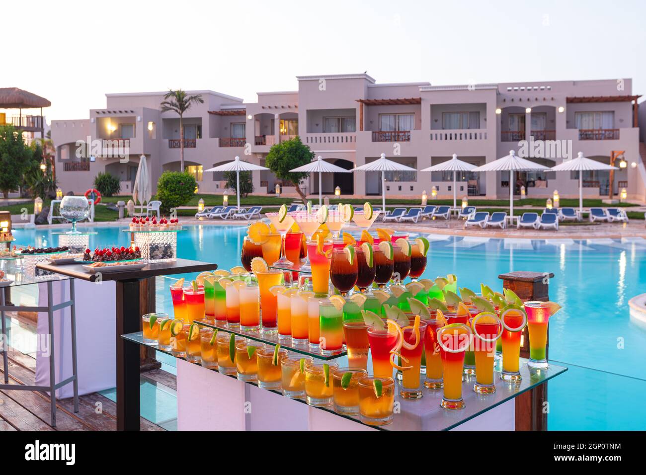 Pyramid of different coloured alcohol and non-alcohol Stock Photo - Alamy
