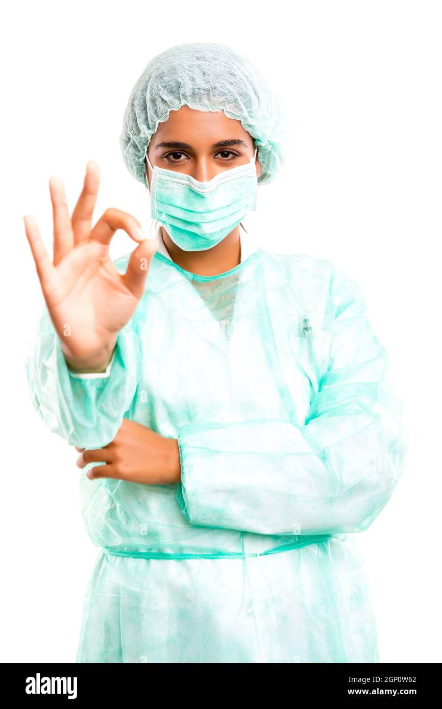 Young doctor signaling ok, isolated over a white background Stock Photo ...
