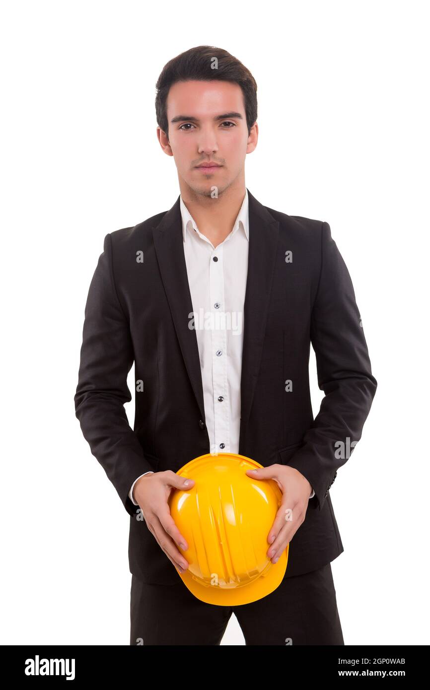 Handsome young engineer posing isolated over white background Stock ...