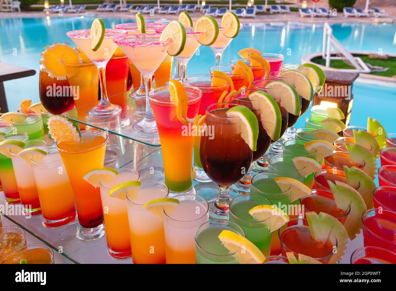 Pyramid of different coloured alcohol and non-alcohol Stock Photo - Alamy