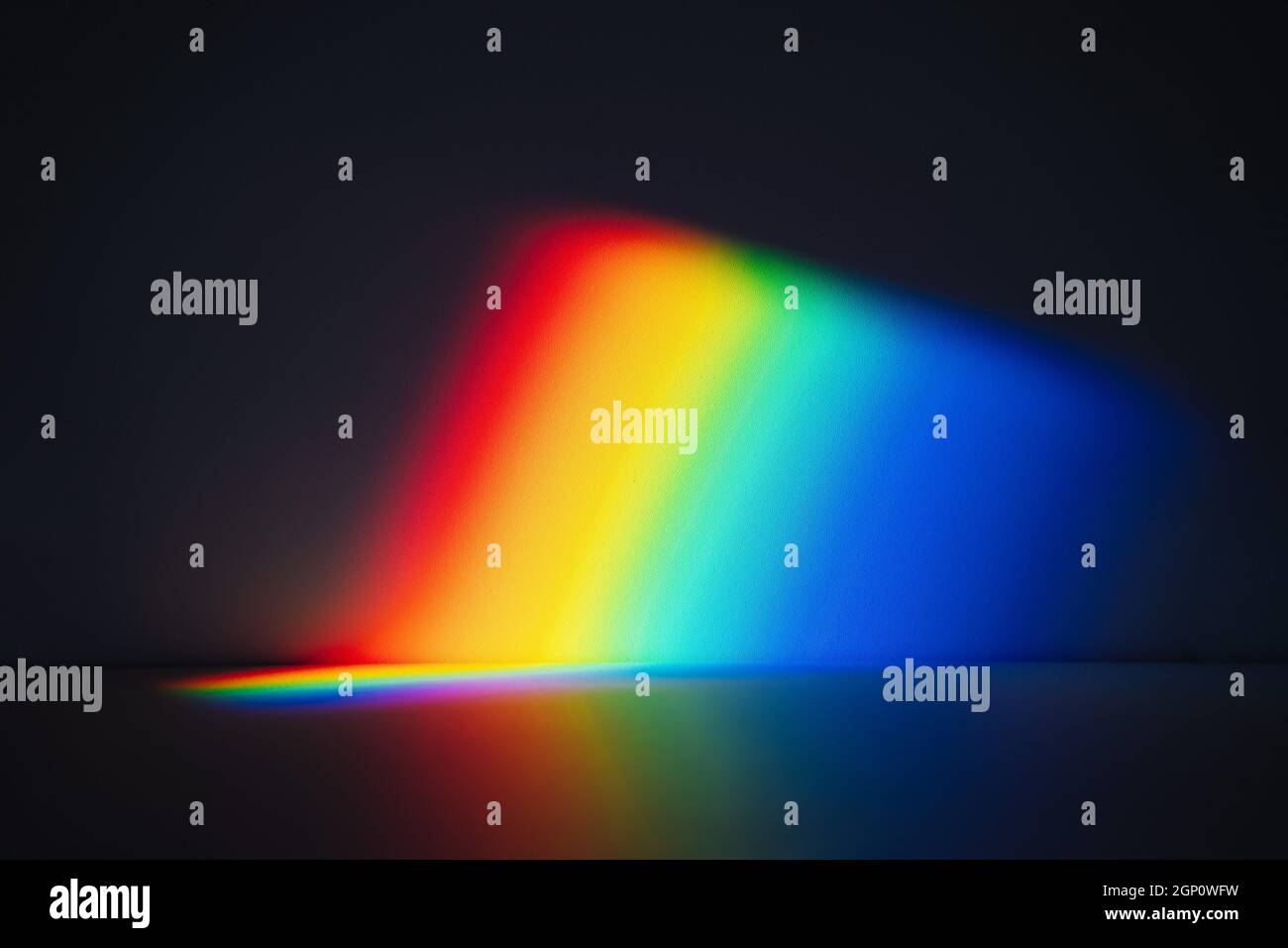 A Prism Full Rainbow Light on paper Background Overlay Stock Photo - Alamy