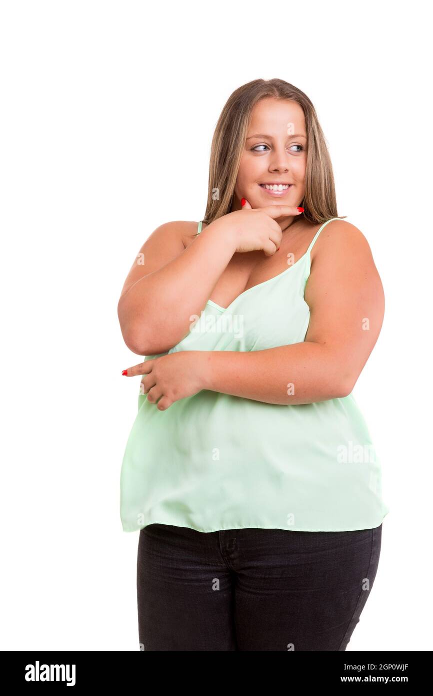 Happy overweighted woman posing isolated over white background Stock ...