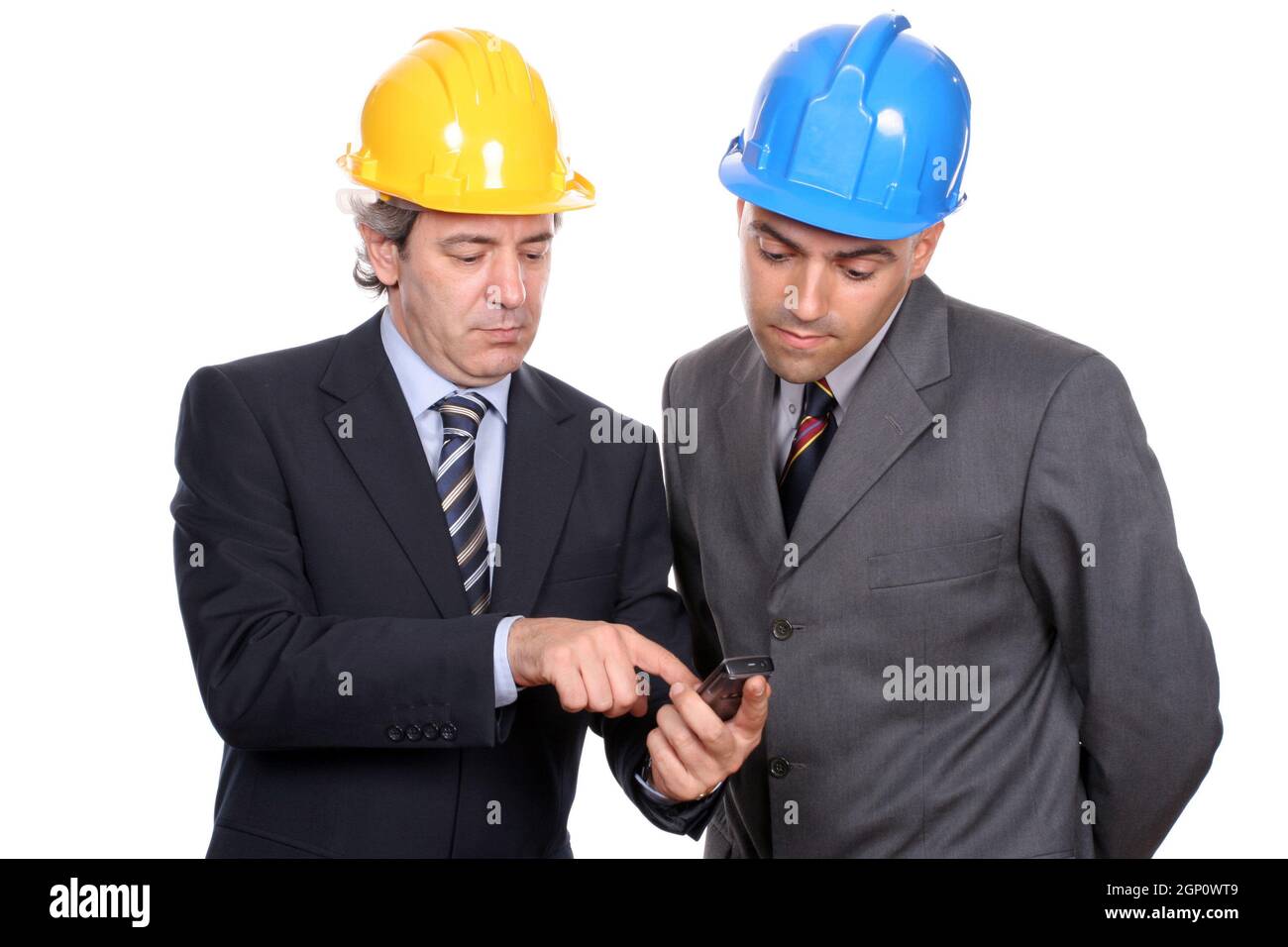 Two Engineers or Architects, on the phone, isolated in white background ...