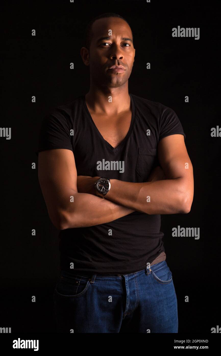 Young and beautiful african man posing isolated Stock Photo - Alamy