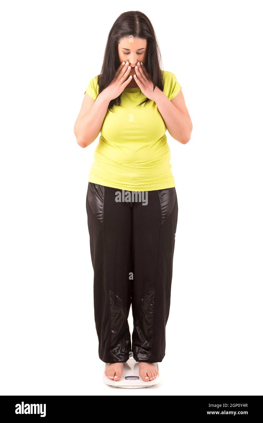 Fat woman very worried with her weight Stock Photo - Alamy
