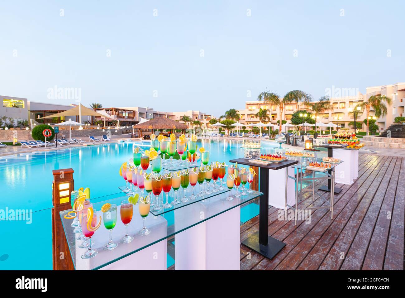 Pyramid of different coloured alcohol and non-alcohol Stock Photo - Alamy