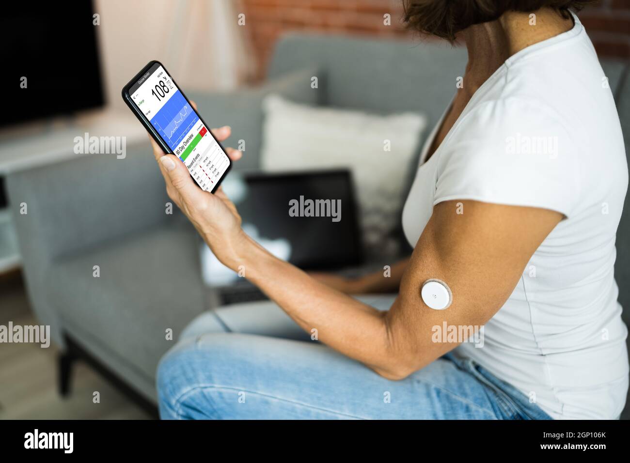 Patient Using Continuous Glucose Blood Sugar Test Stock Photo - Alamy