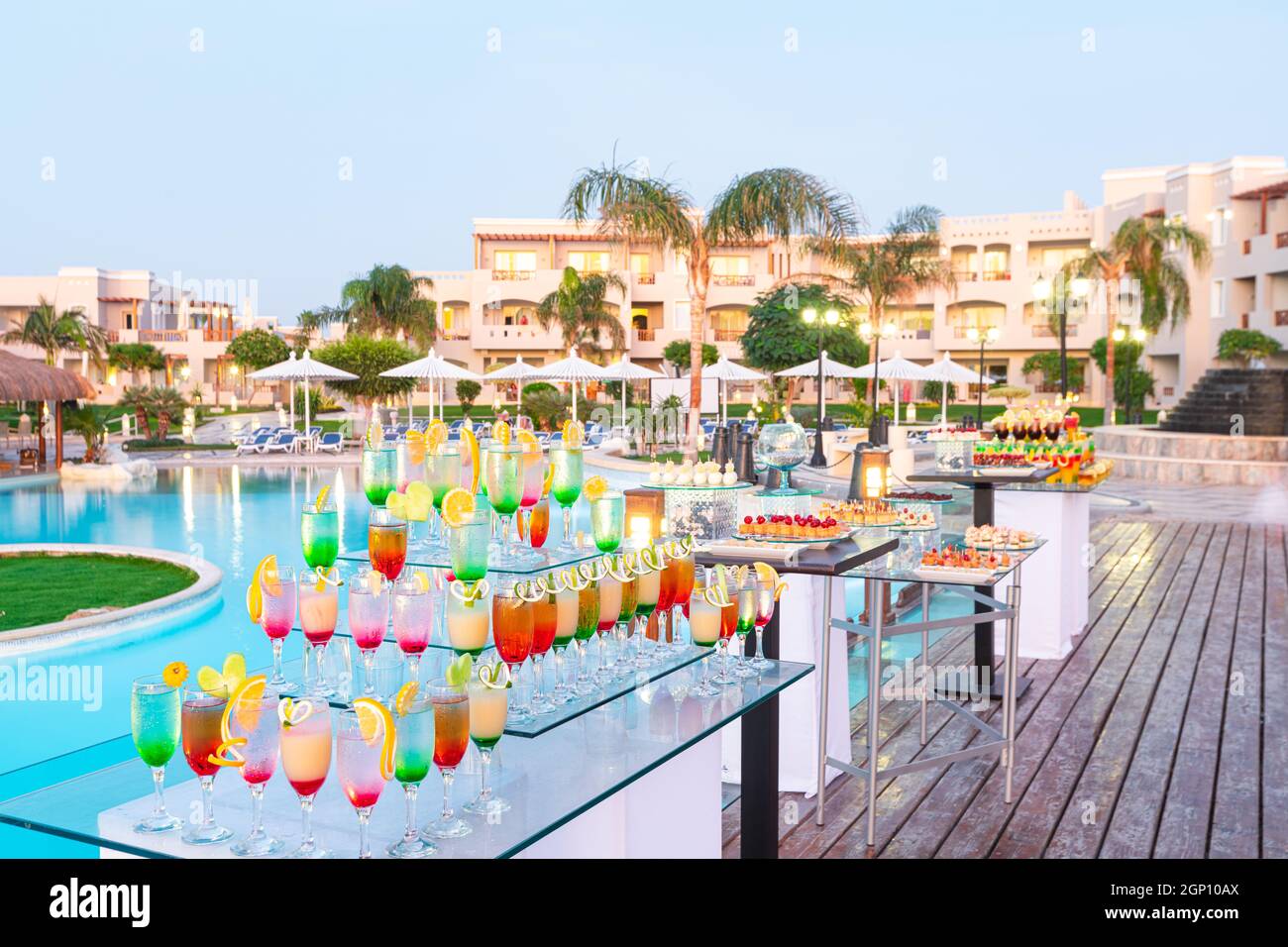 Pyramid of different coloured alcohol and non-alcohol Stock Photo - Alamy