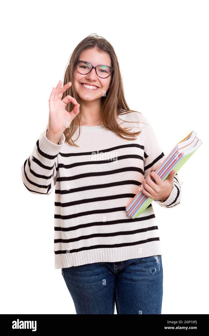 Young student posing over a white background Stock Photo - Alamy