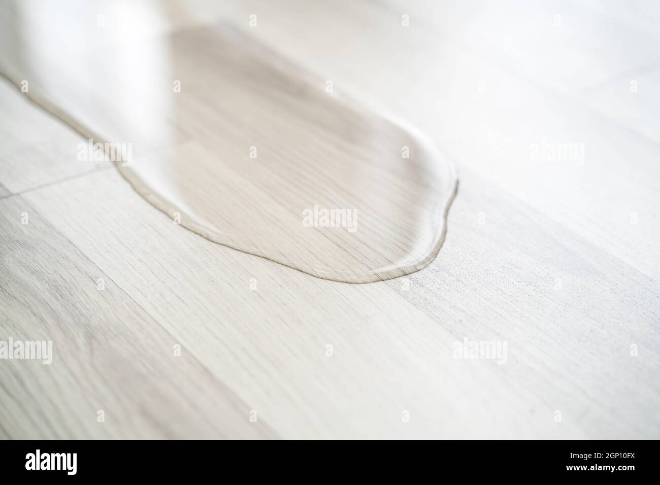 Water On House Floor Surface. Laminate Damage Stock Photo - Alamy