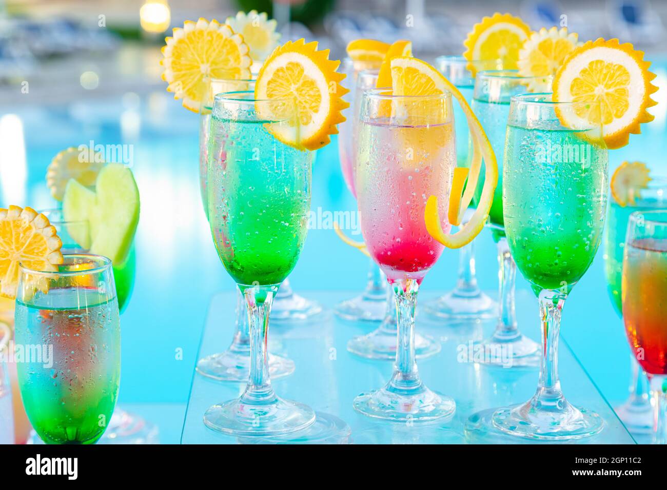 Pyramid of different coloured alcohol and non-alcohol Stock Photo - Alamy
