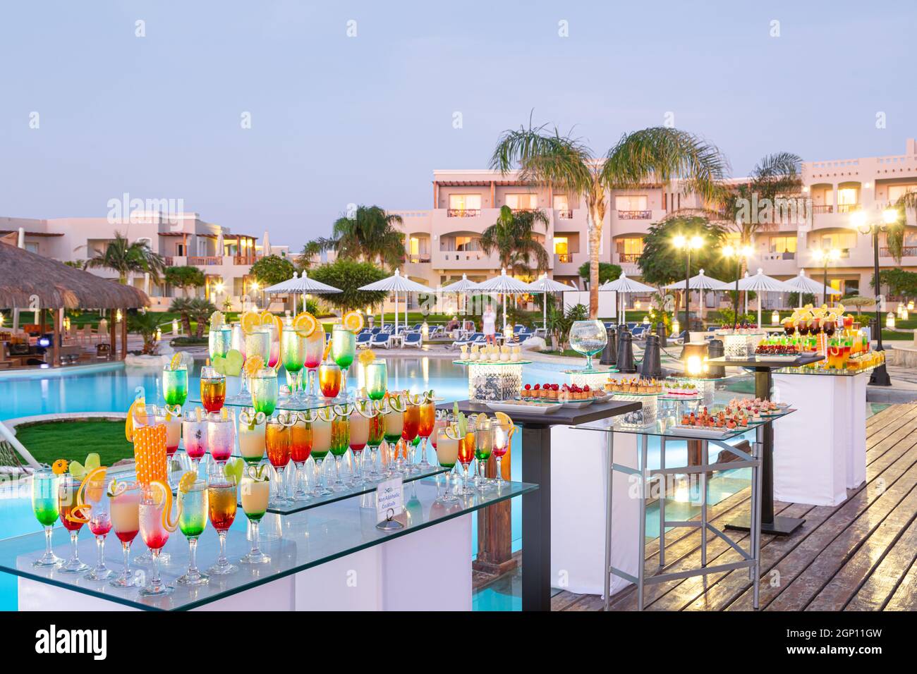 Pyramid of different coloured alcohol and non-alcohol Stock Photo - Alamy