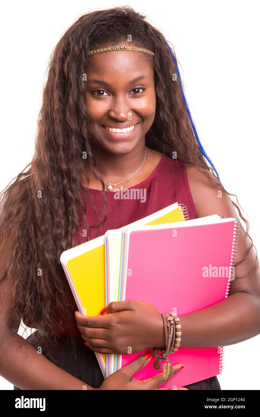 Beautiful african student woman posing isolated over white background ...