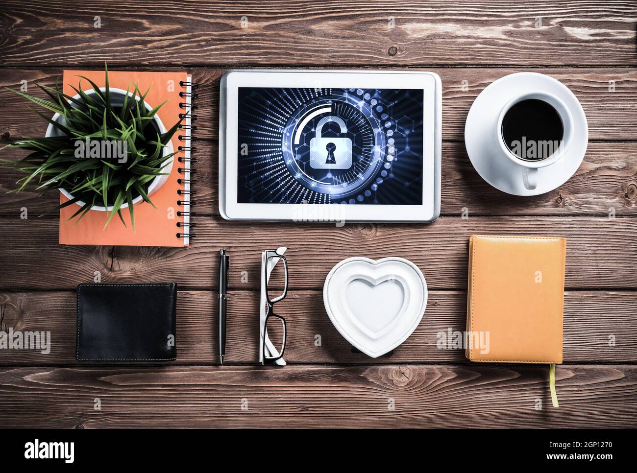 Web security and technology concept with tablet pc on wooden table ...