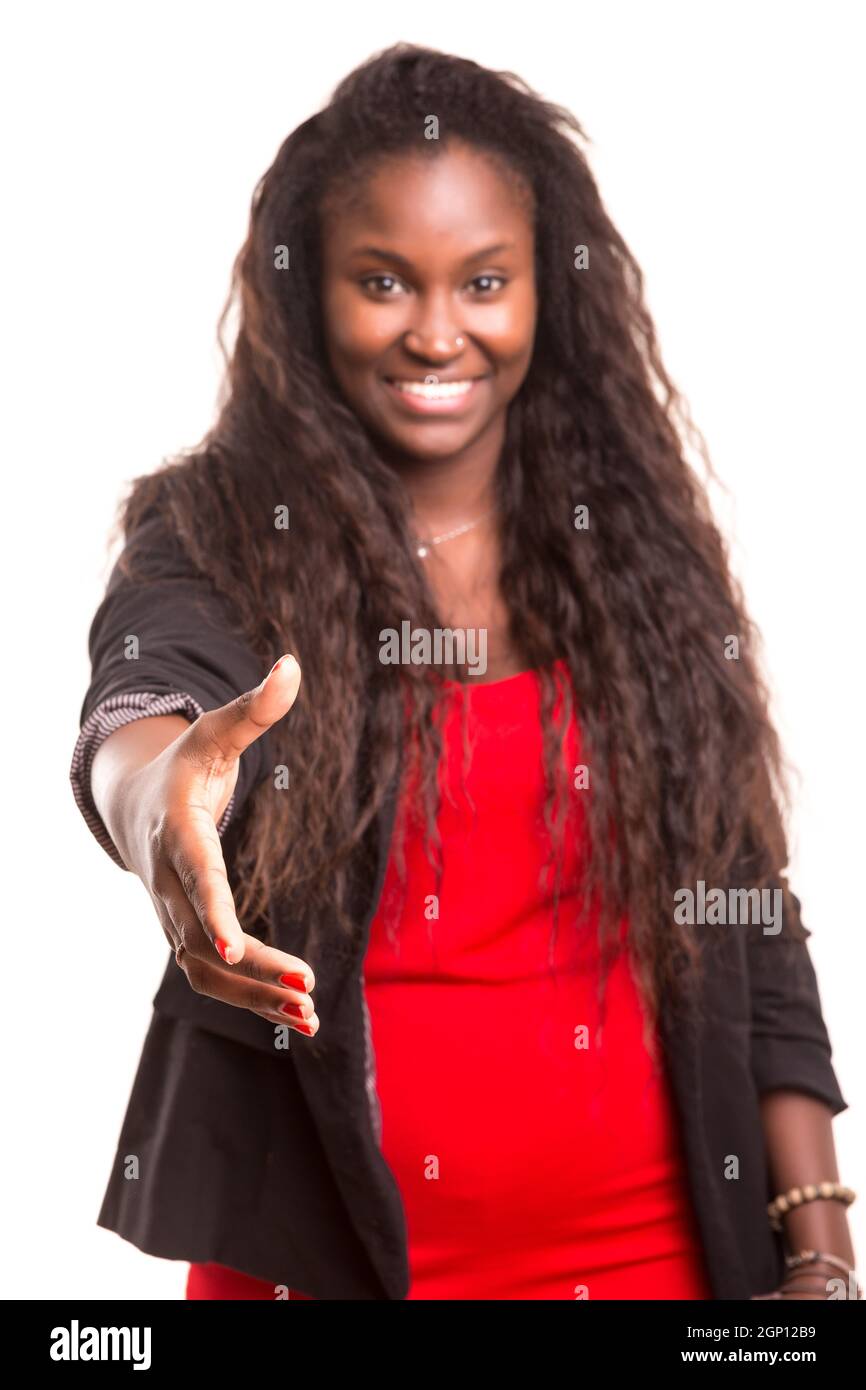A beautiful business woman offering handshake, isolated over white ...