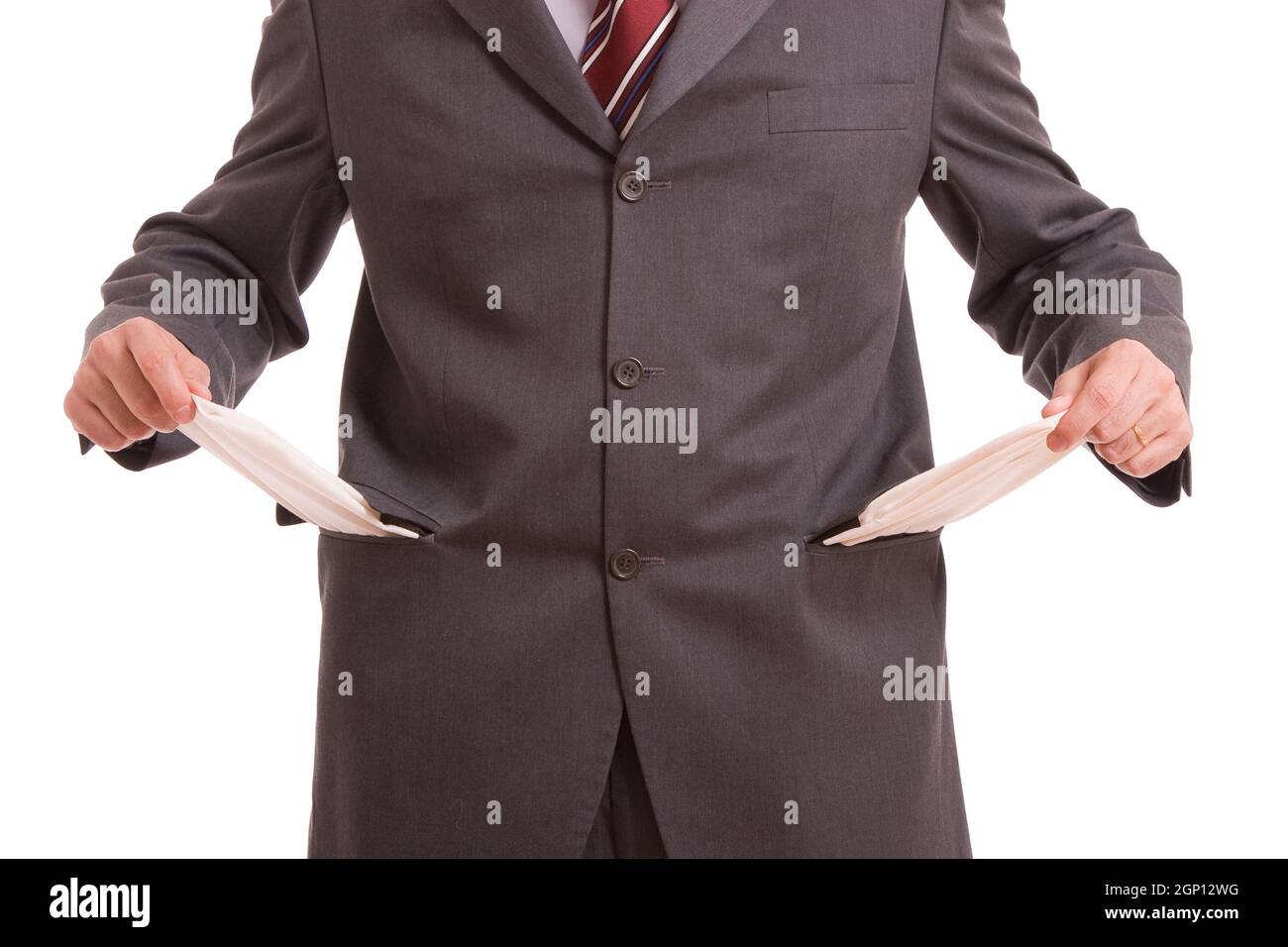 Man holding empty pockets, isolated over white background Stock Photo ...