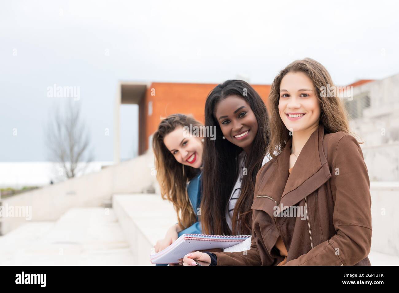 Group multi ethnic young students at the university campus Stock Photo ...