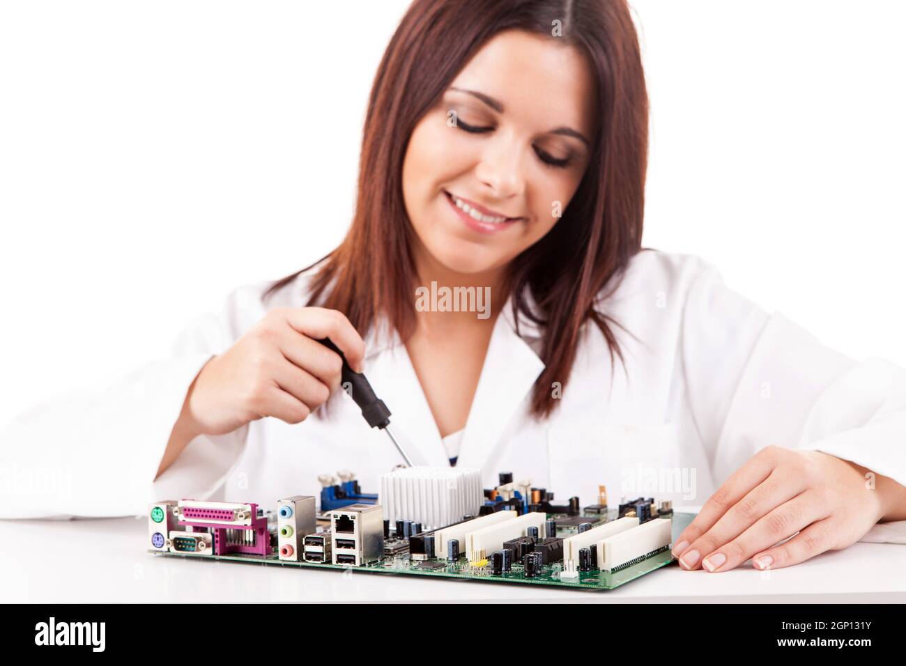 Happy and successful young computer technician Stock Photo - Alamy