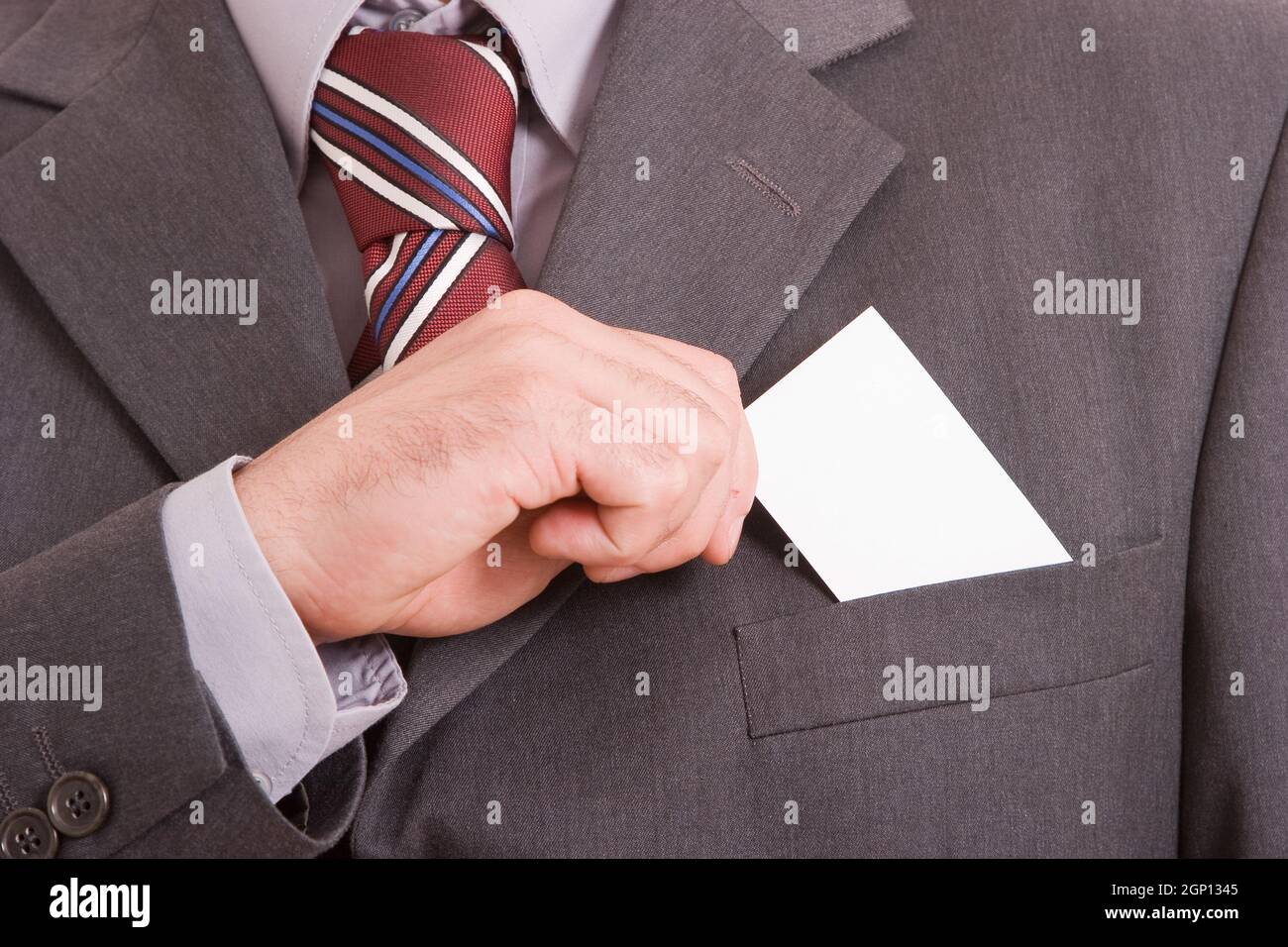 Business man offering card, isolated over white background Stock Photo ...