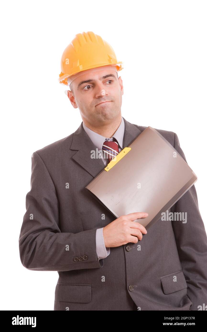 Engineer posing isolated over white background Stock Photo - Alamy