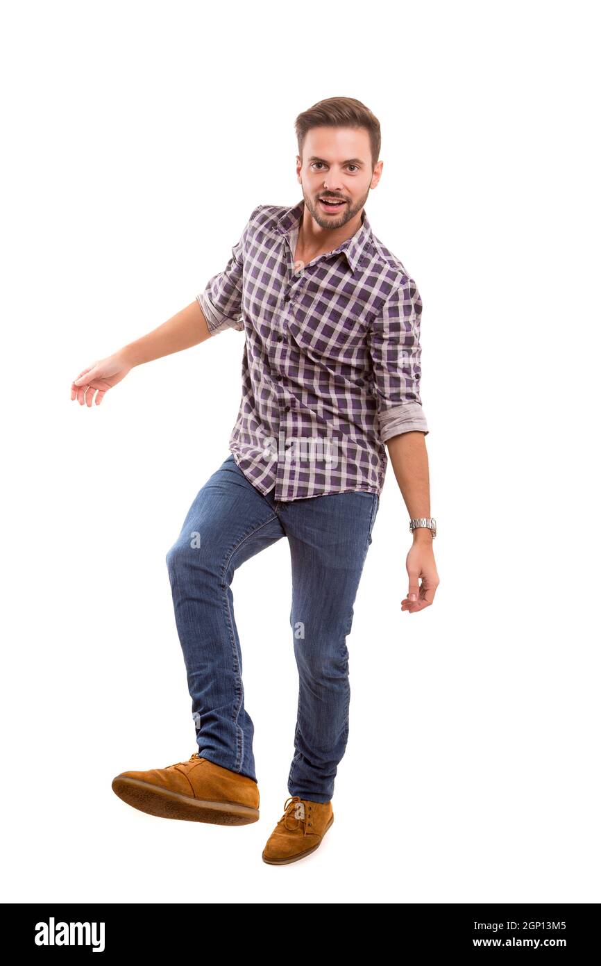 Studio picture of a young and handsome man posing isolated Stock Photo ...