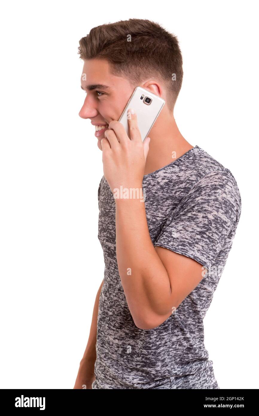 Young boy at the phone, isolated over white Stock Photo - Alamy