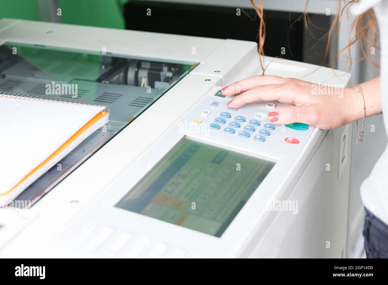 Detail of a modern digital printer of a copy center Stock Photo - Alamy