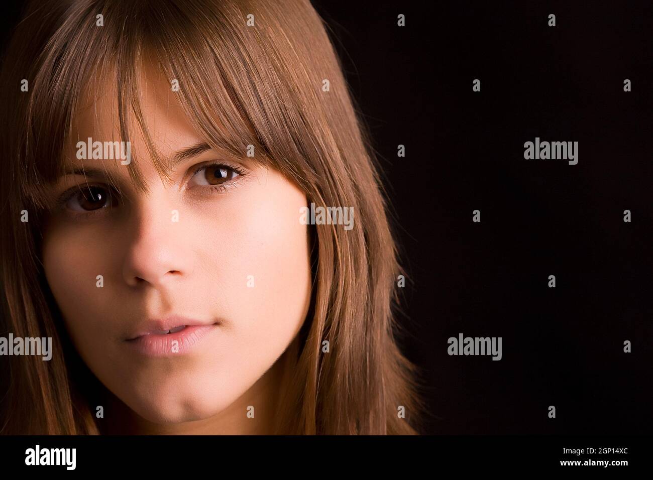 Low key portrait of a beautiful woman Stock Photo - Alamy