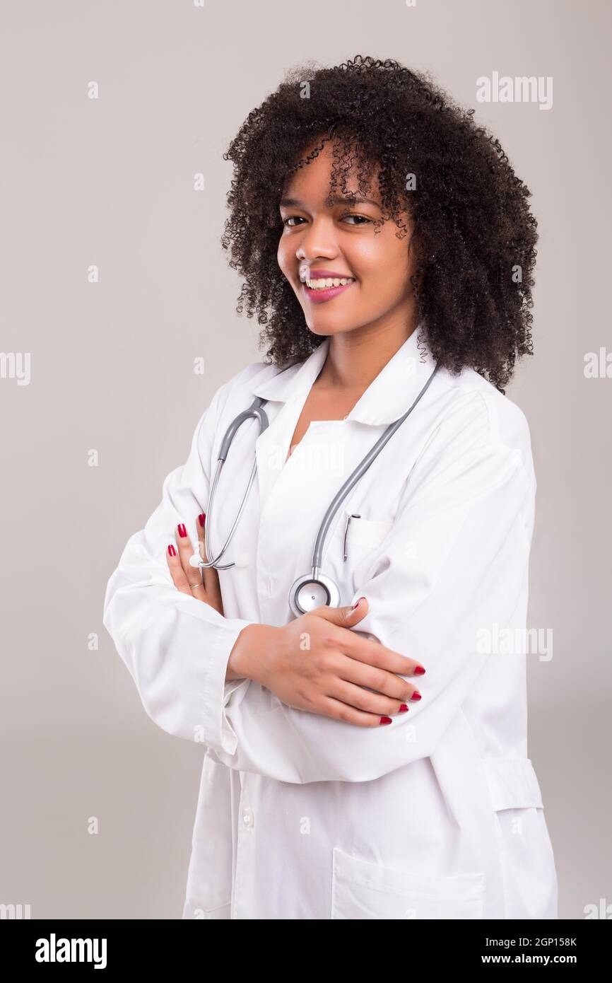 Studio shot of a beautiful african doctor Stock Photo - Alamy