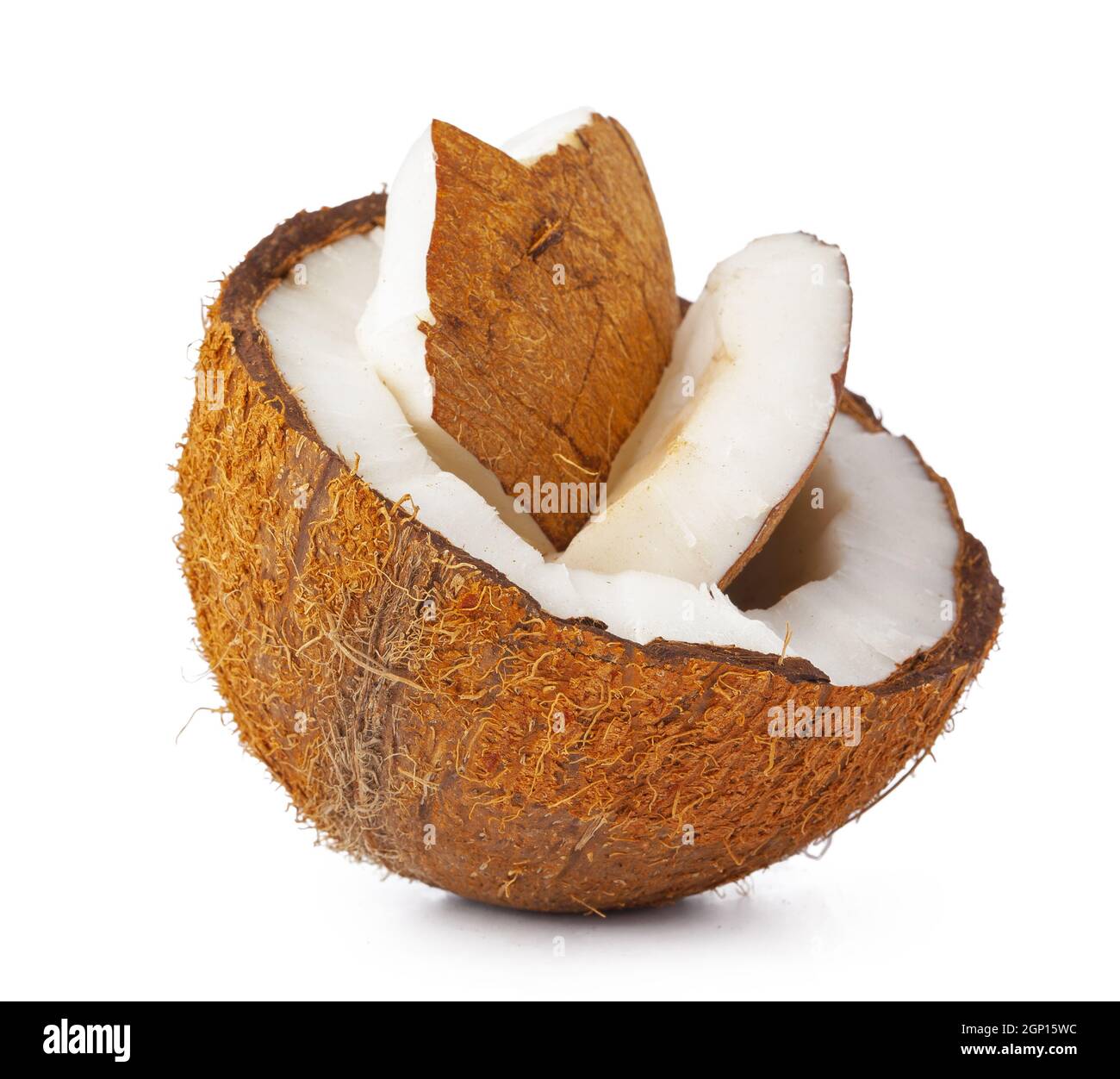 Coconut pieces pile isolated on white background Stock Photo - Alamy