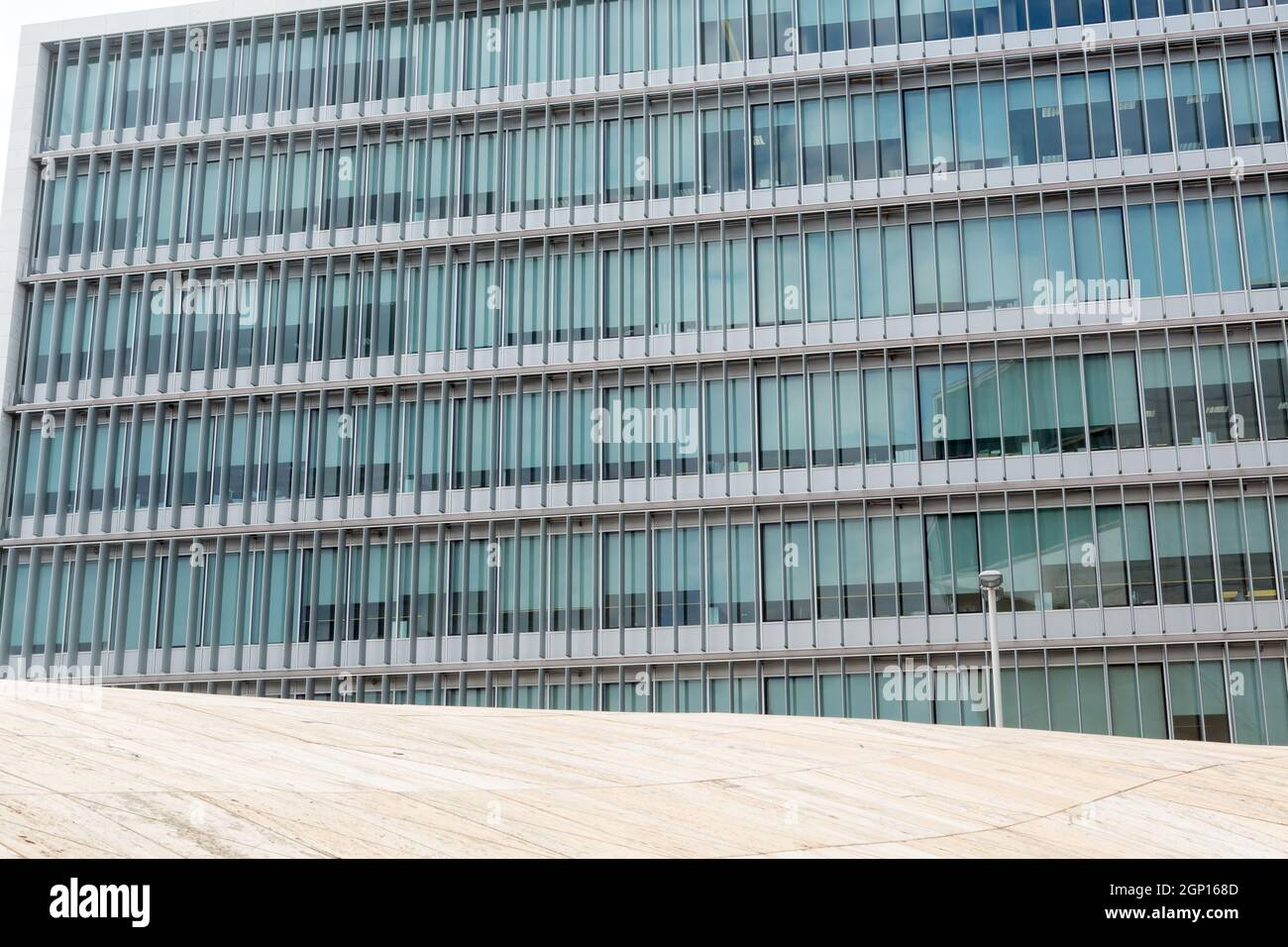 Facade of a modern building full of windows Stock Photo - Alamy