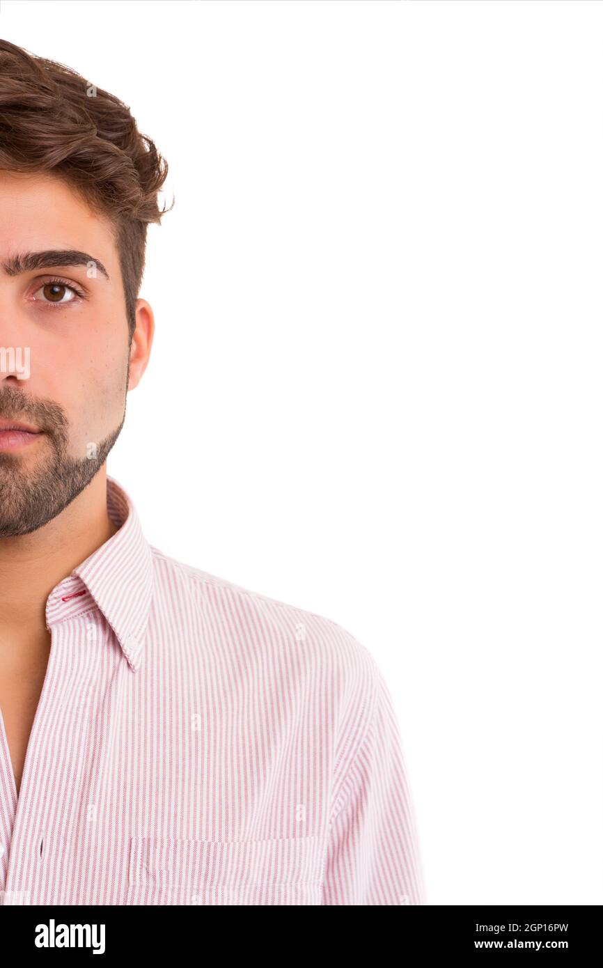 Studio picture of a young and handsome man posing isolated Stock Photo ...