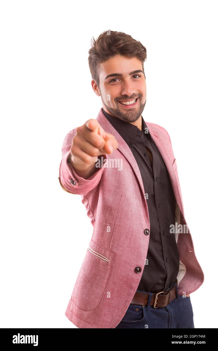 Handsome young man pointing at you, isolated over white background ...