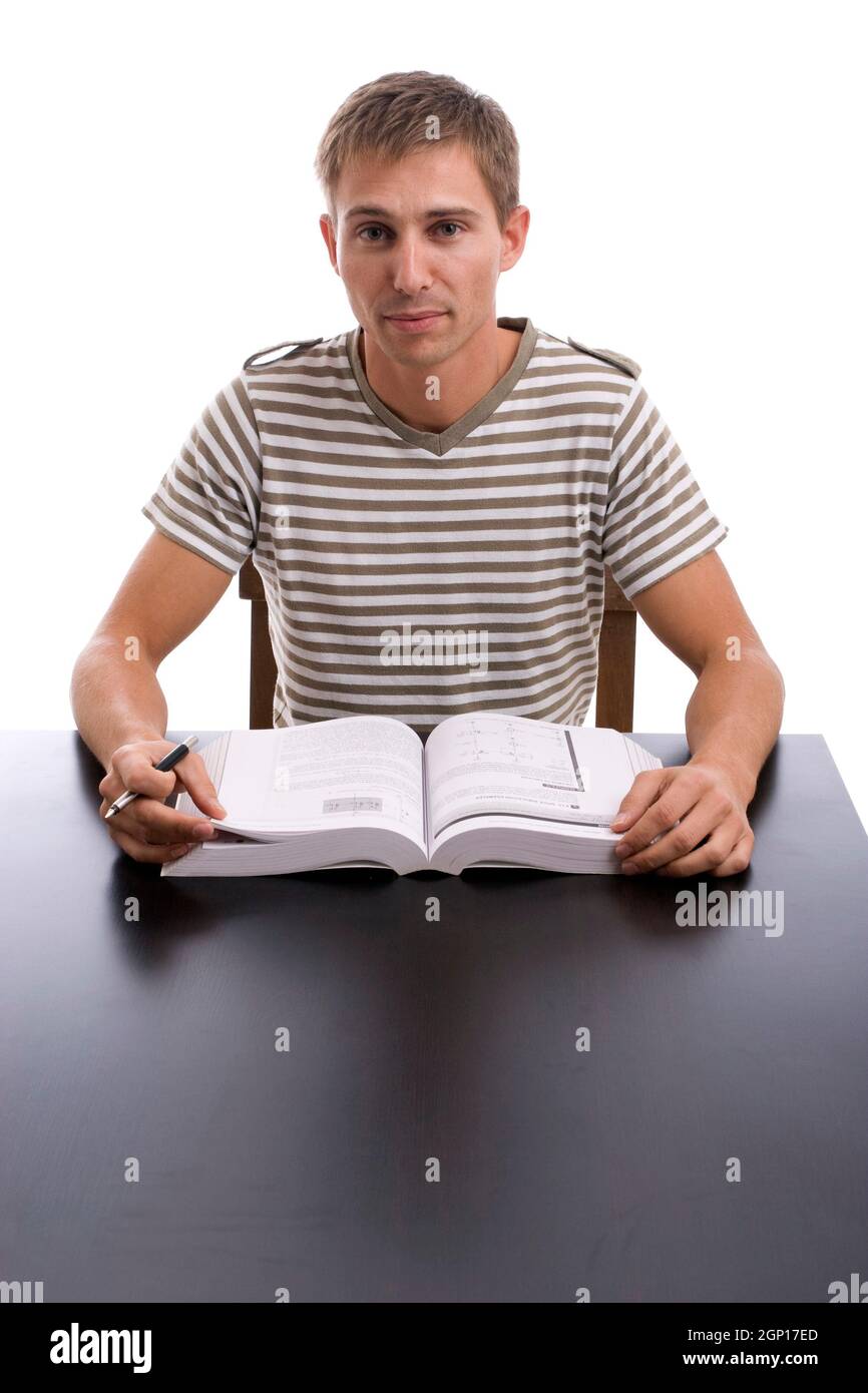 Young boy studying, isolated over white background Stock Photo - Alamy