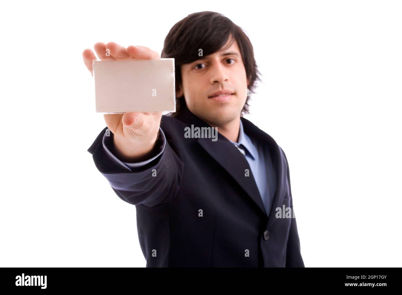 businessman offering businesscard over white background - focus on card ...