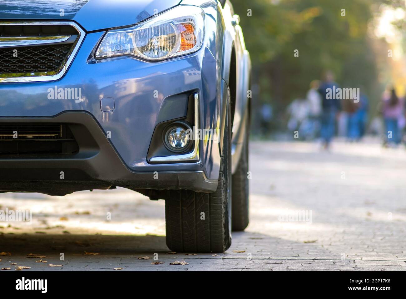 New clean car parked on a city street side Stock Photo - Alamy