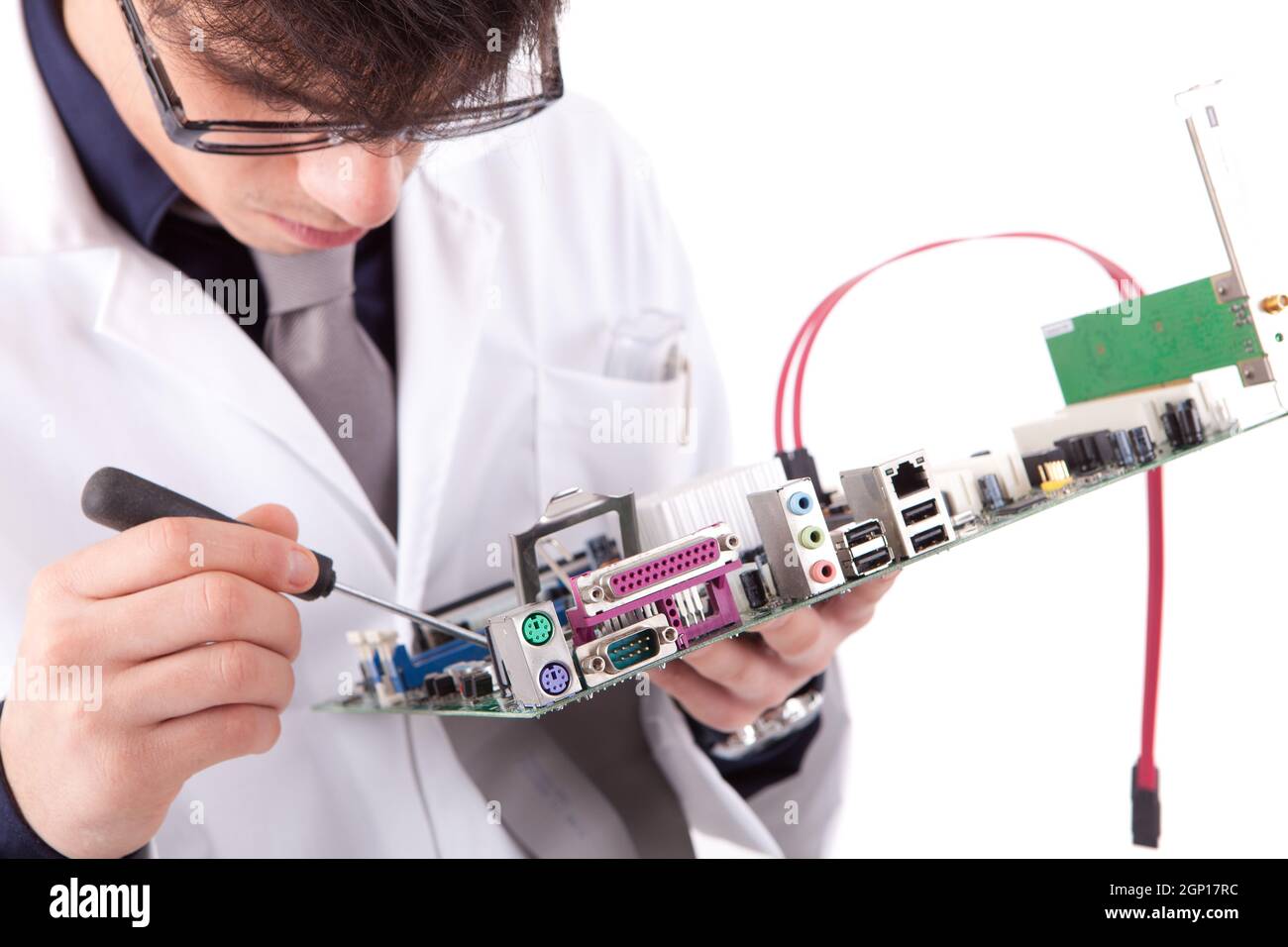 Computer engineer working on an old motherboard Stock Photo - Alamy