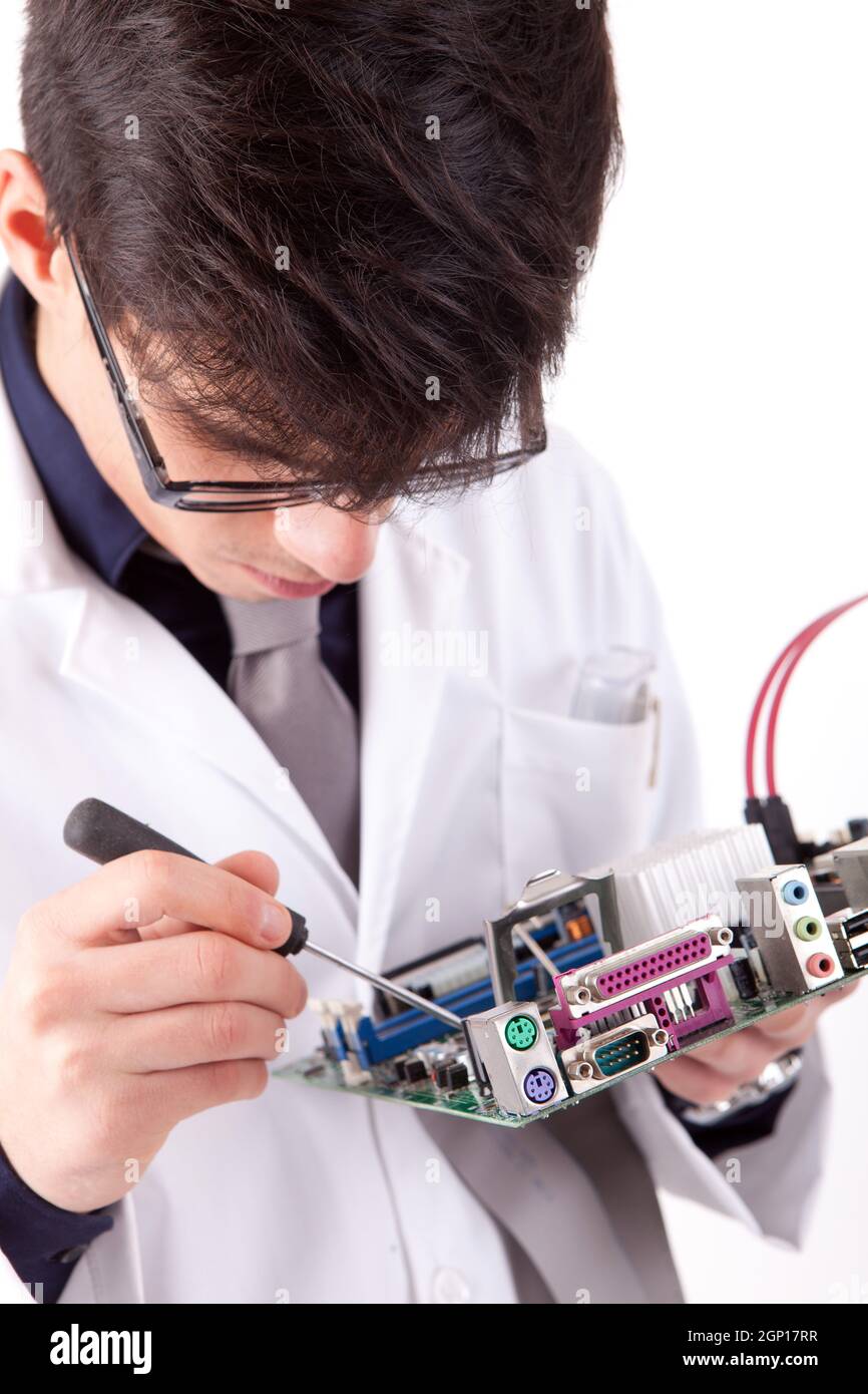 Computer engineer working on an old motherboard Stock Photo - Alamy