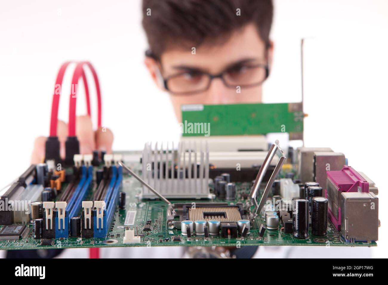 Computer engineer working on an old motherboard Stock Photo - Alamy