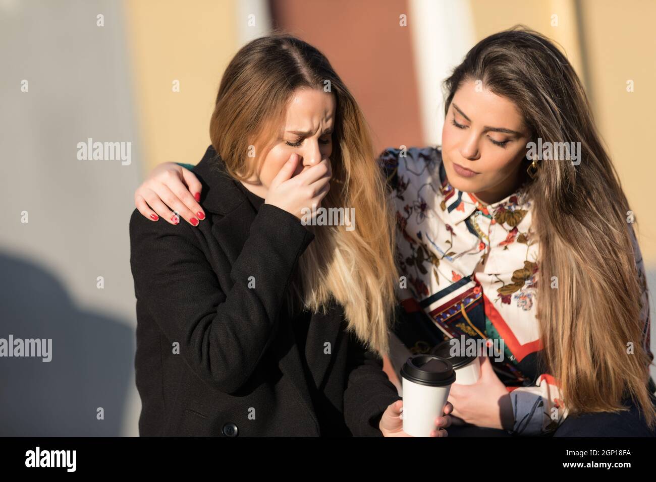 Woman crying hug hi-res stock photography and images - Alamy