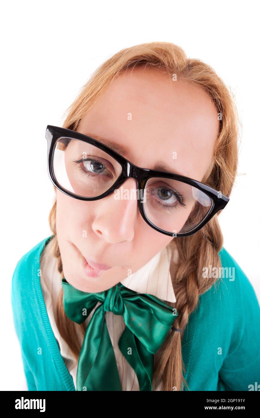 Silly nerd schoolgirl, posing over a white background Stock Photo - Alamy
