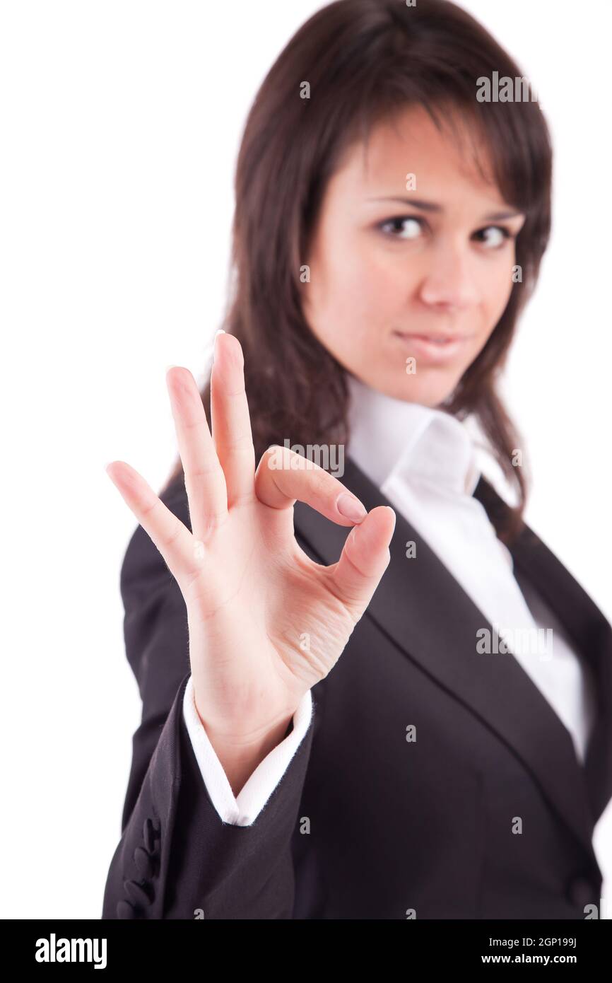 Business woman signaling ok - focus on finger Stock Photo - Alamy